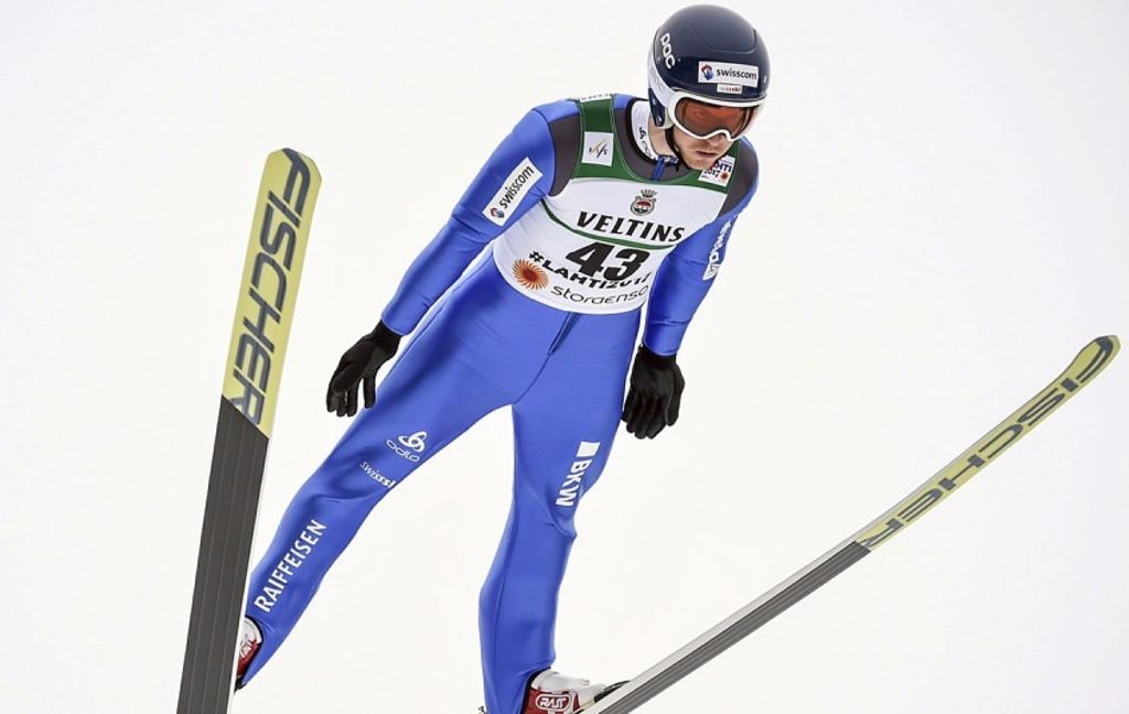 Tim Hug finit 14e, dans la douleur